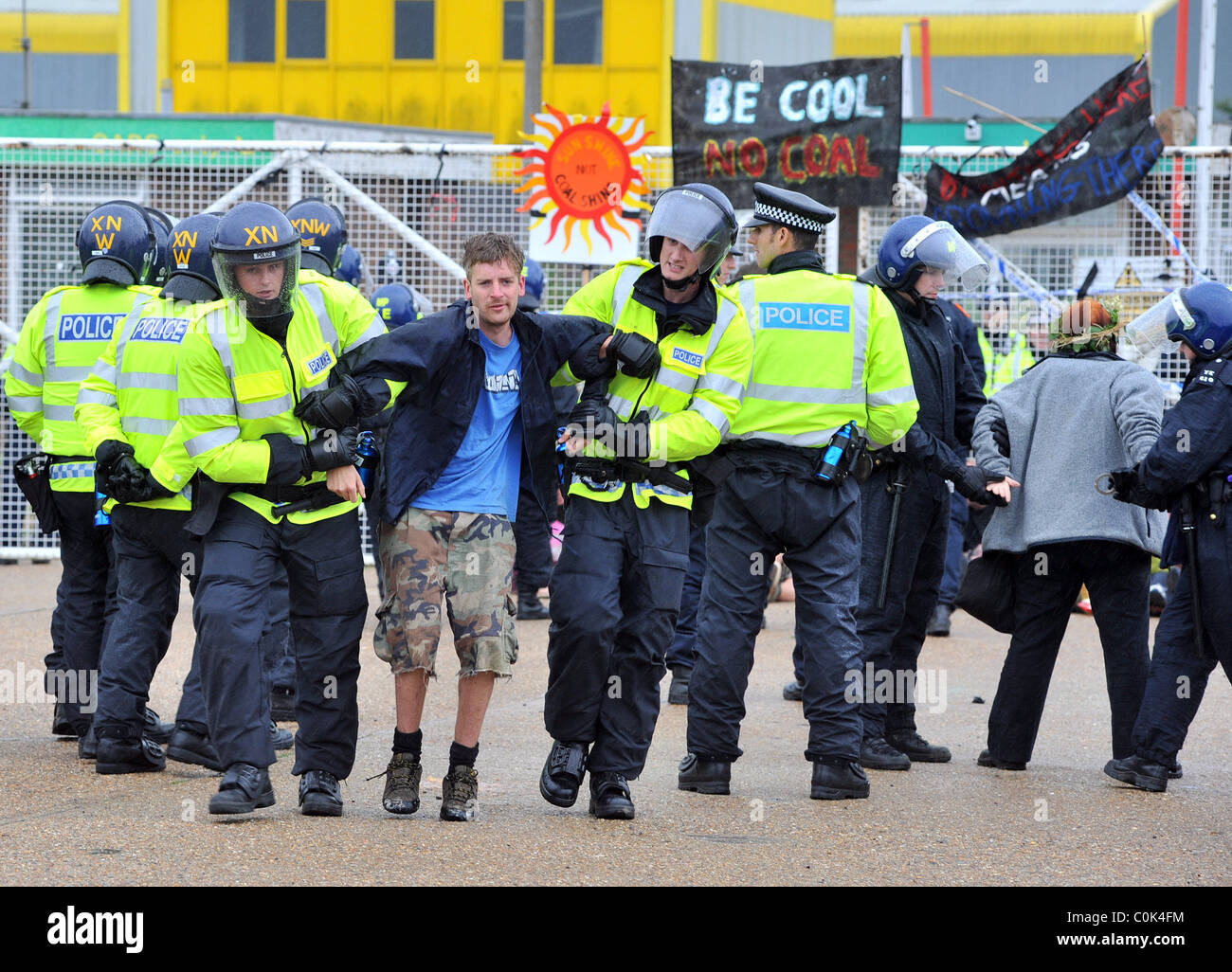 Protesters confront police at the Camp for Climate Action outside ...