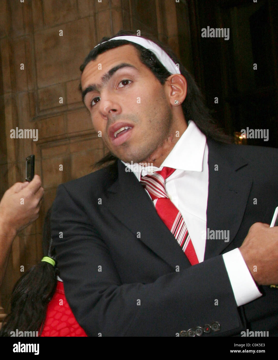 Carlos Tevez Manchester United football team leaving The Landmark Hotel ...