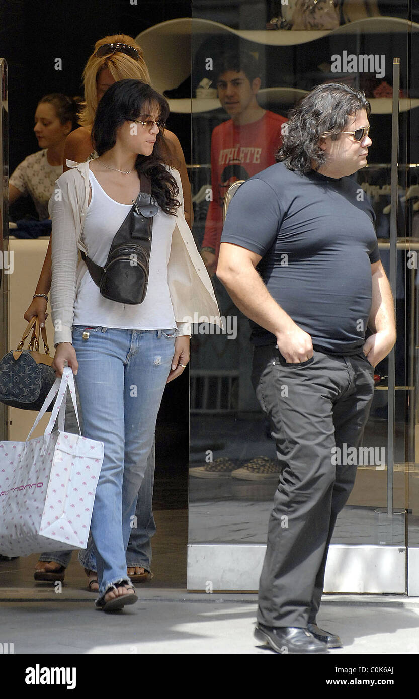 Michelle Rodriguez visits several clothes shops whilst out with a ...