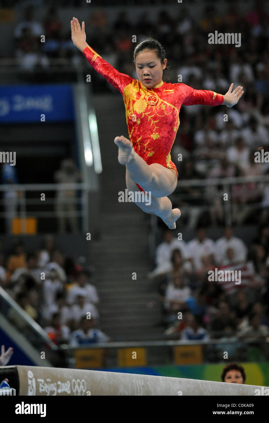 China's Cheng Fei competes during gymnastics artistic women's team ...