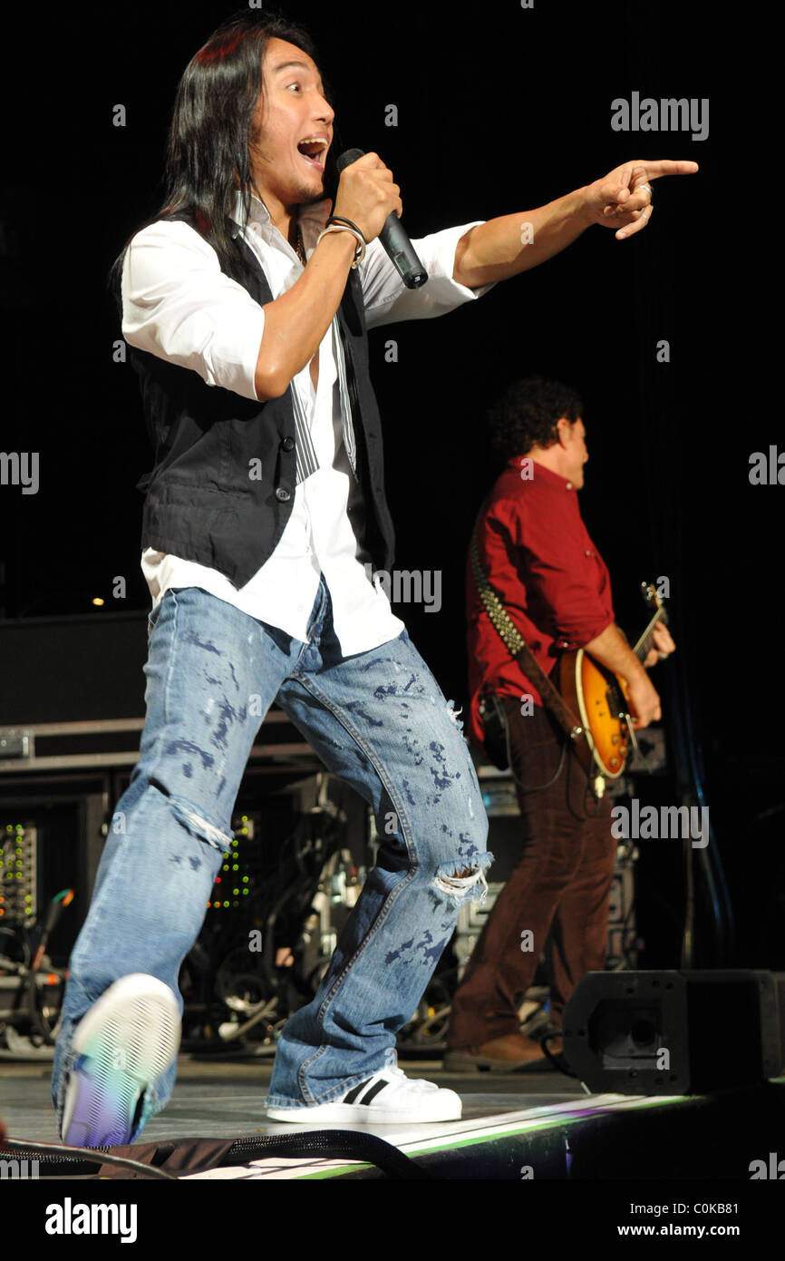 Arnel Pineda of Journey performing live in concert at the Cruzan ...