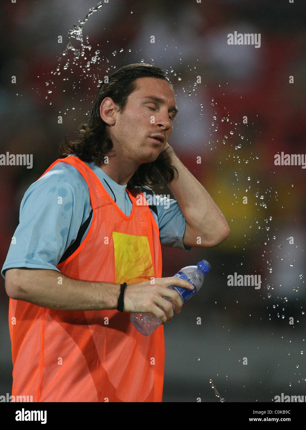 Lionel Messi is a substitute in the game during the Olympic soccer ...