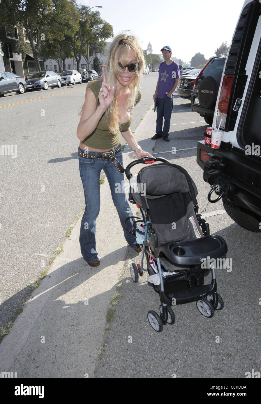 Melissa London AKA Melissa Cunningham exits the Byron Allen hair salon ...