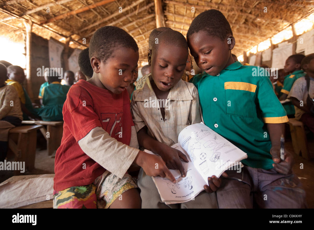 Children learn in a grass hut school in Dedza, Malawi, Southern Africa ...