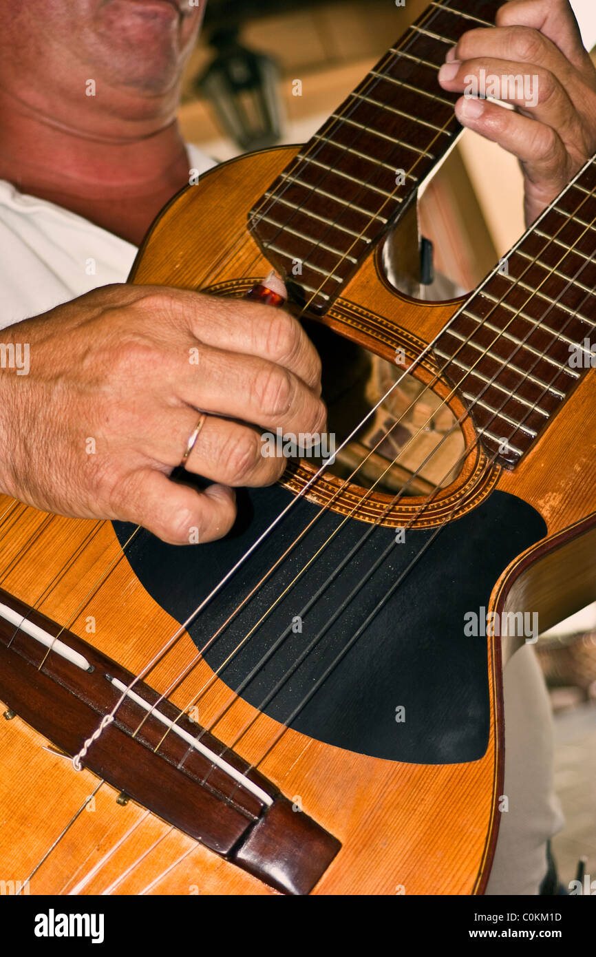 Local musician plays hi-res stock photography and images - Alamy