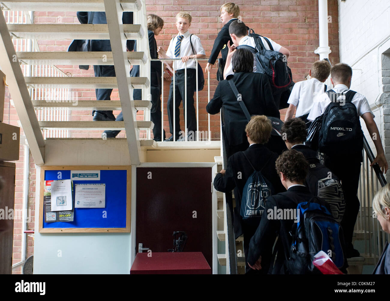 Pupils climb steps at Maidstone Grammar school in Maidstone, Kent, U.K ...