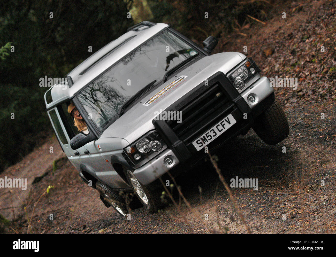 off-roading learning to drive a 4x4 off-road Stock Photo - Alamy