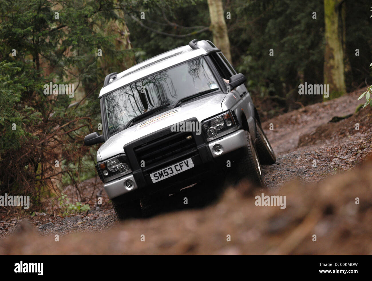 off-roading learning to drive a 4x4 off-road Stock Photo - Alamy