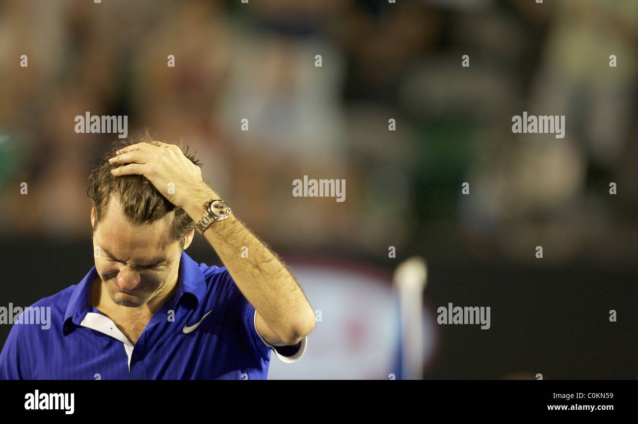 Roger Federer breaks down crying during the trophy presentation after ...
