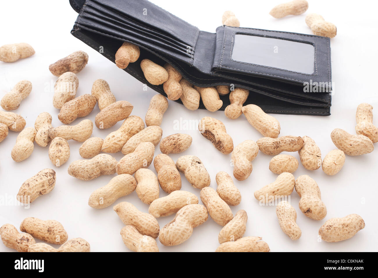 Working for peanuts Stock Photo - Alamy