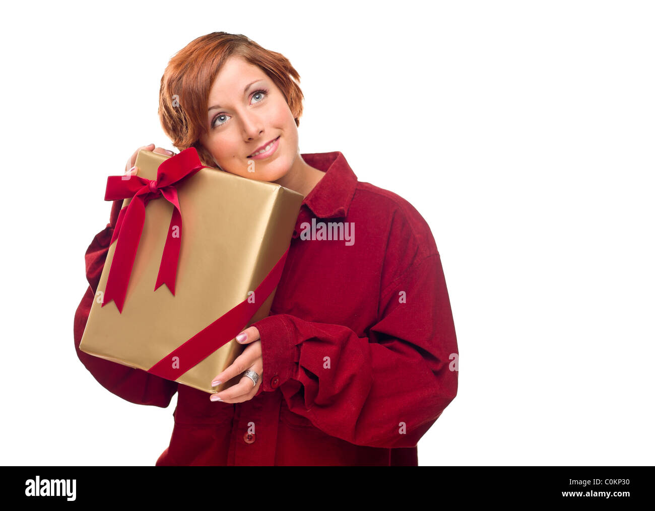 Pretty Red Haired Girl with Wrapped Gift Isolated on a White Background ...