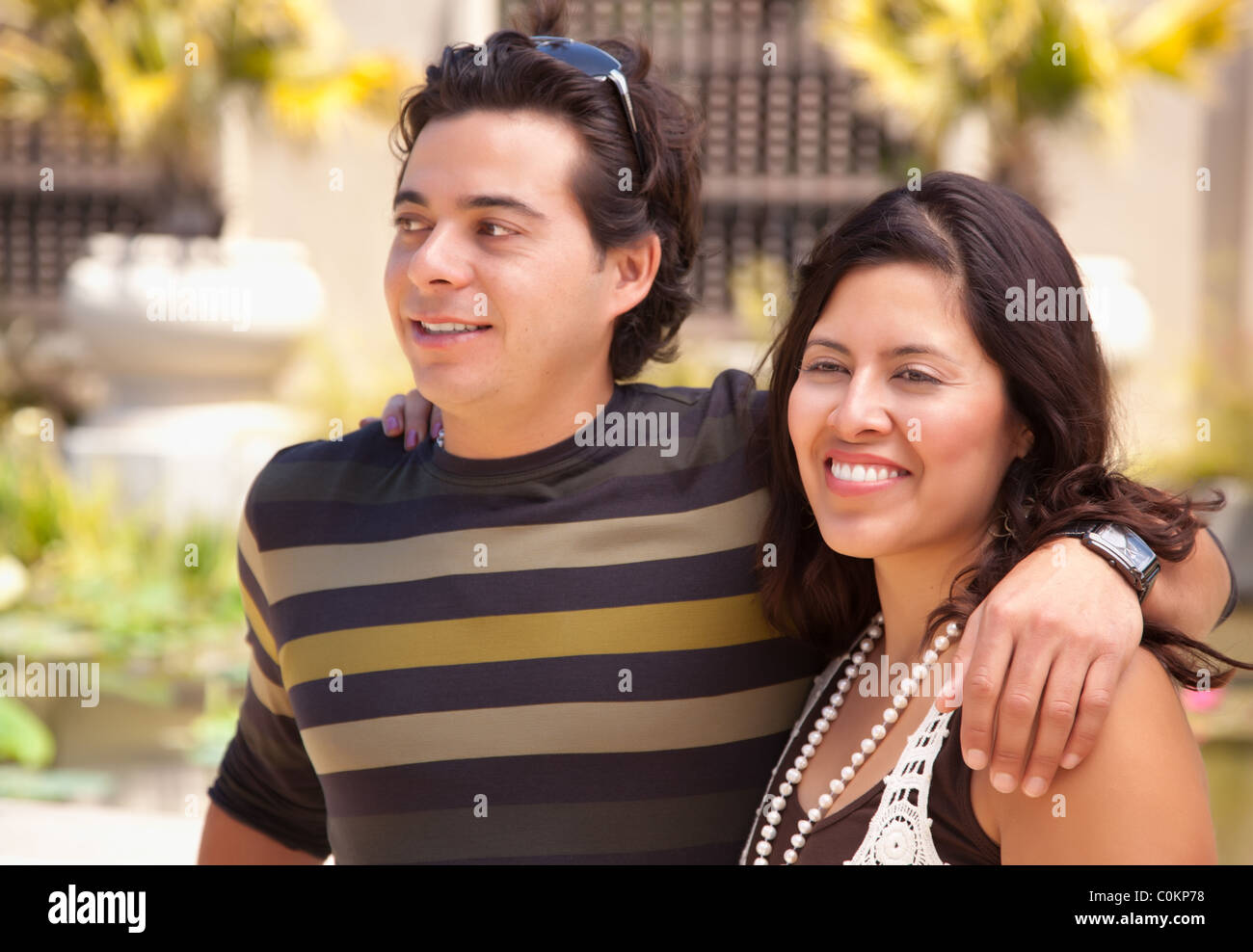 Attractive Hispanic Couple Enjoying a lovely day At The Park Stock ...