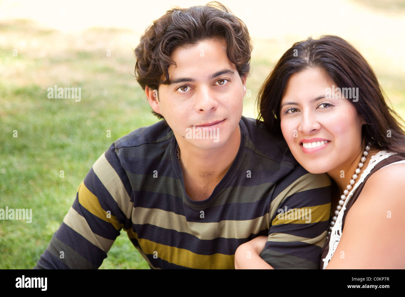 Attractive Hispanic Couple Portrait Enjoying Each Other Outdoors Stock ...