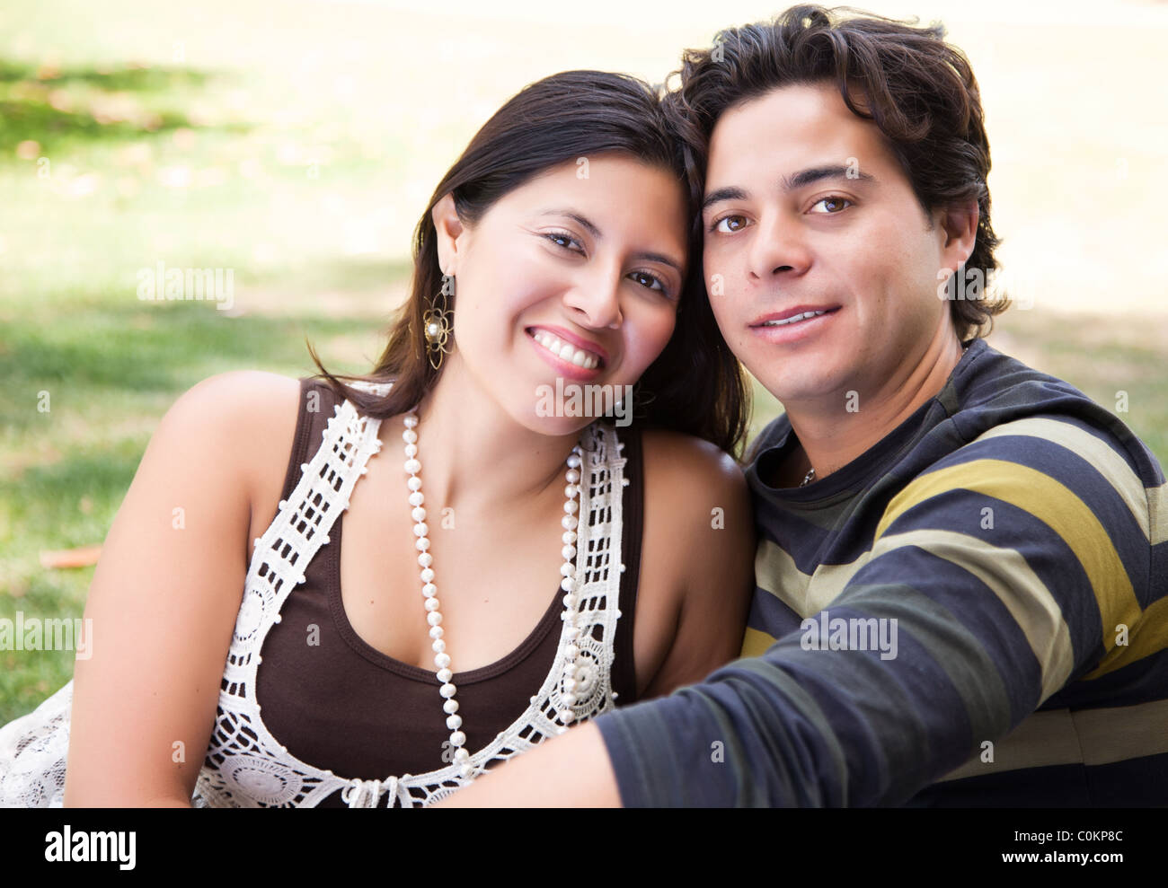 Attractive Hispanic Couple Portrait Enjoying Each Other Outdoors Stock ...