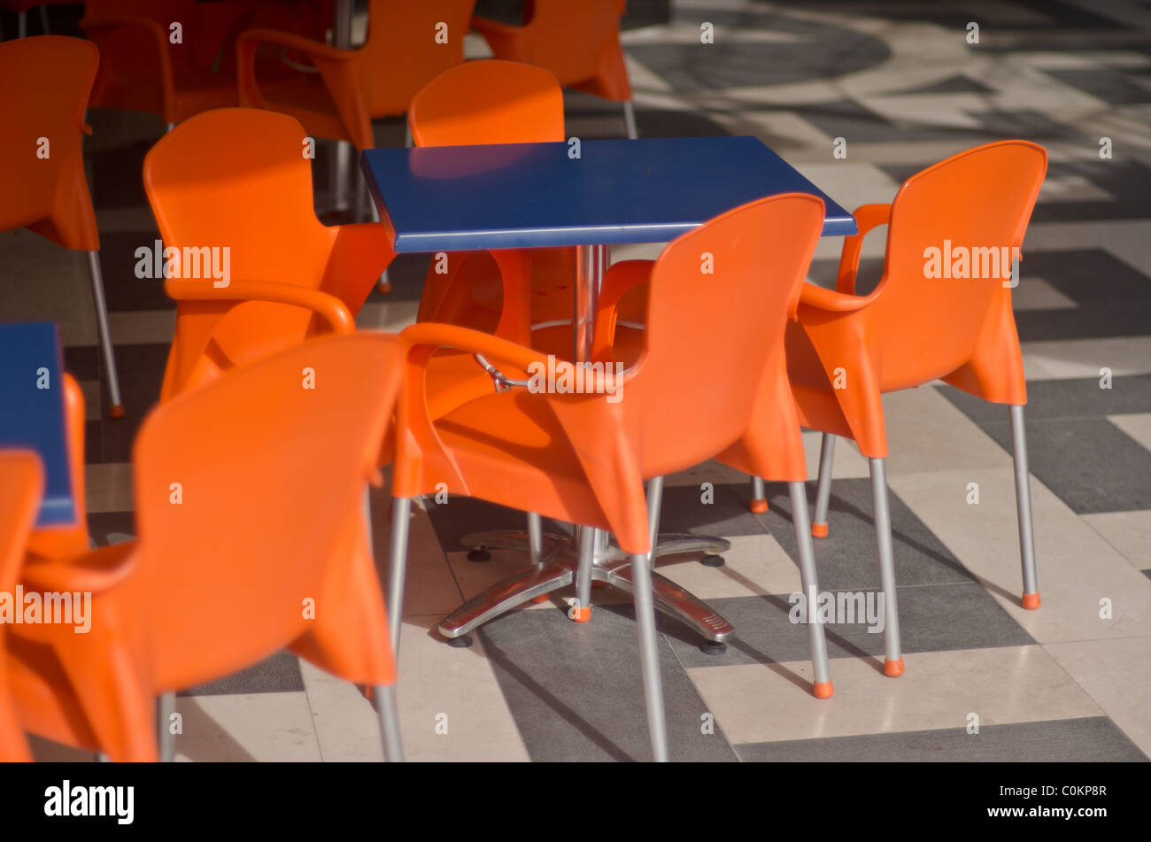 orange café seats Stock Photo - Alamy