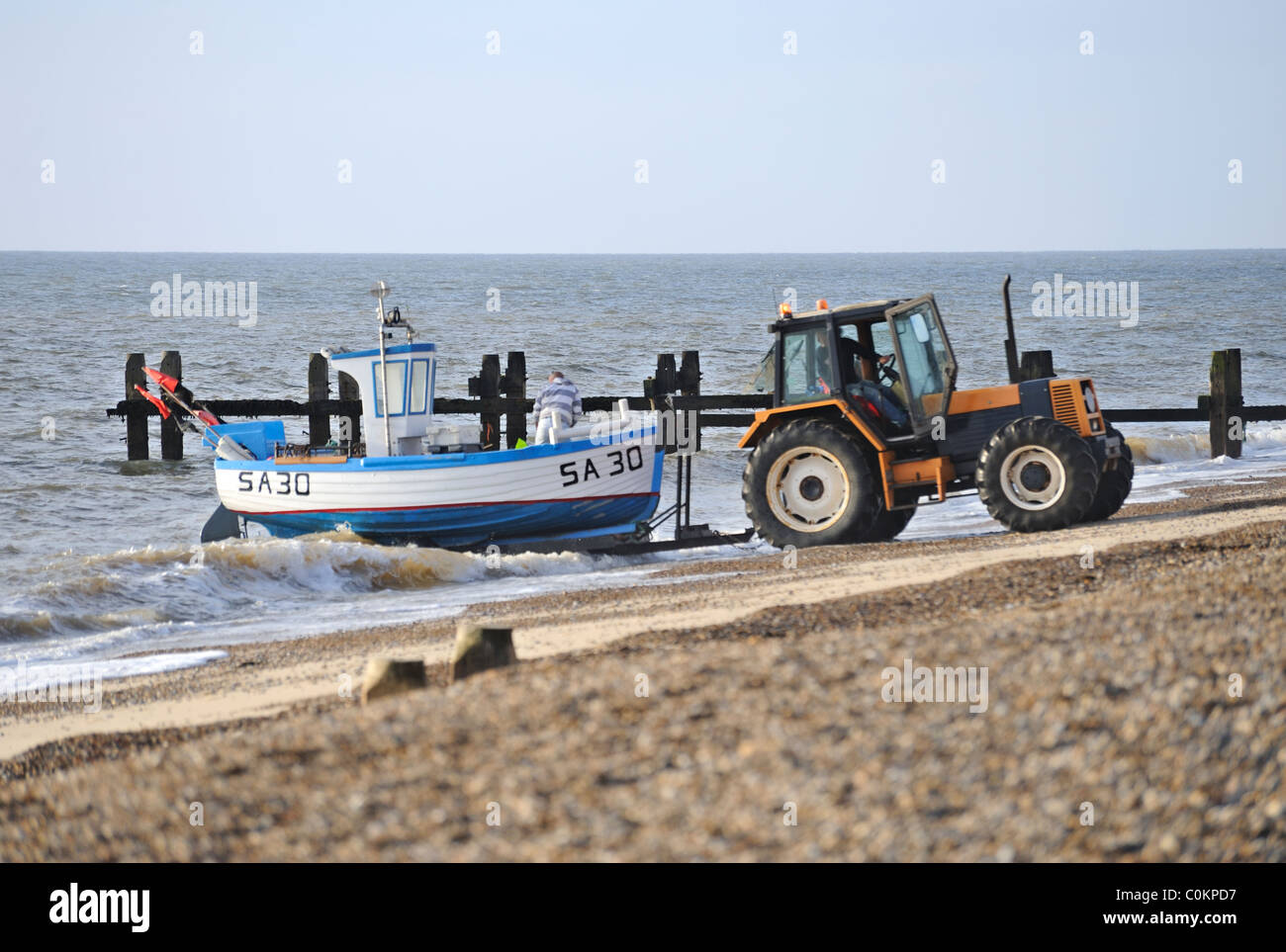 Boat launching at Corton beach, Suffolk, UK Stock Photo - Alamy