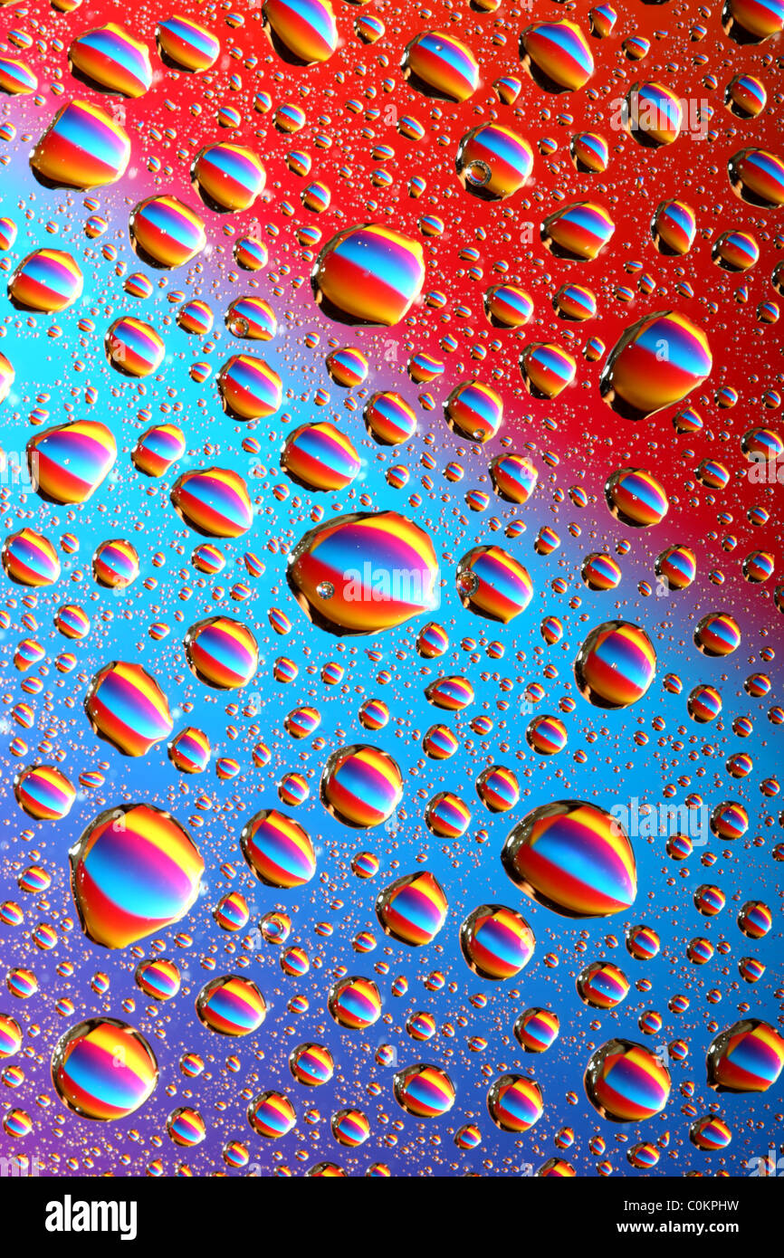 Colorful water drops background Stock Photo - Alamy