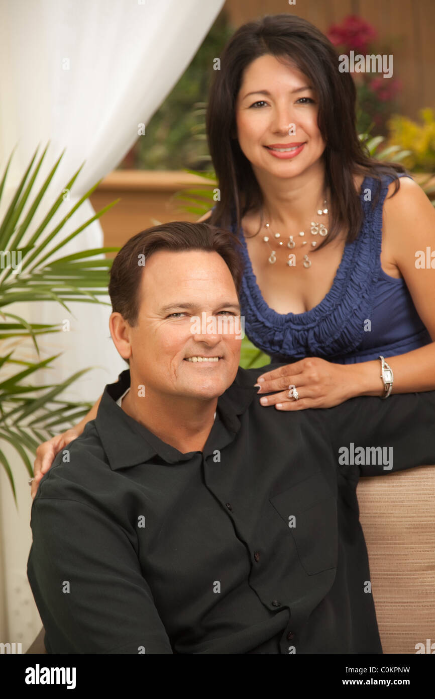 Happy Attractive Hispanic and Caucasian Couple Portrait Stock Photo - Alamy