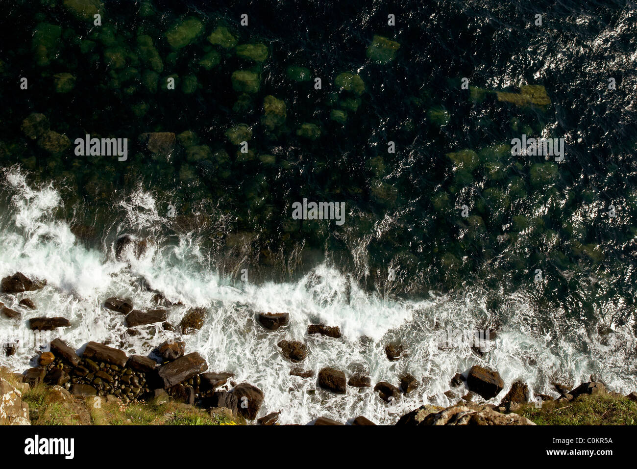 The sea meets the cliffs of Kilt Rock on the Isle of Skye, Scotland ...