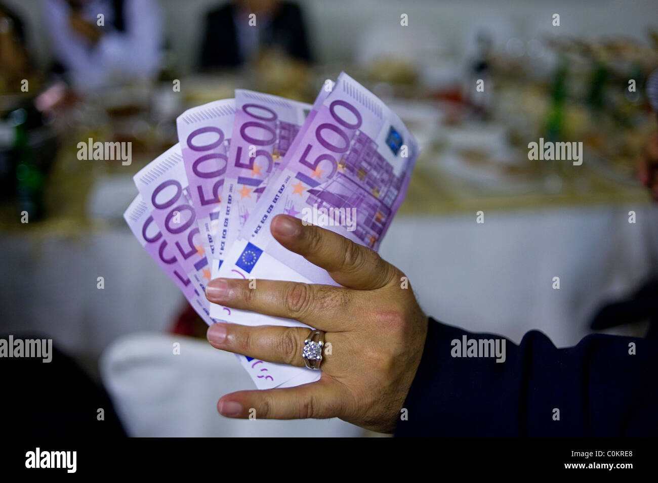Man showing off money hi-res stock photography and images - Alamy