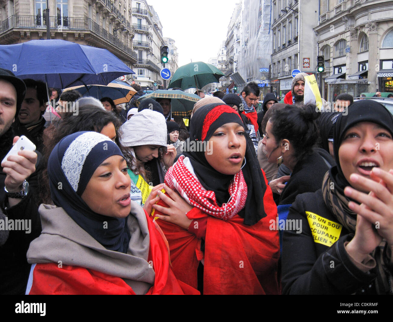 Paris, France, young woman in a crowd at Demonstration, Veiled Arab ...