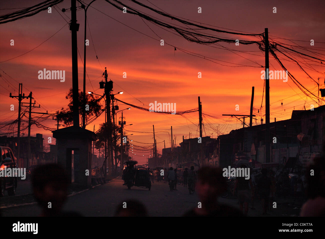 A street scene in the Parola district of Tondo, one of the worst slum ...