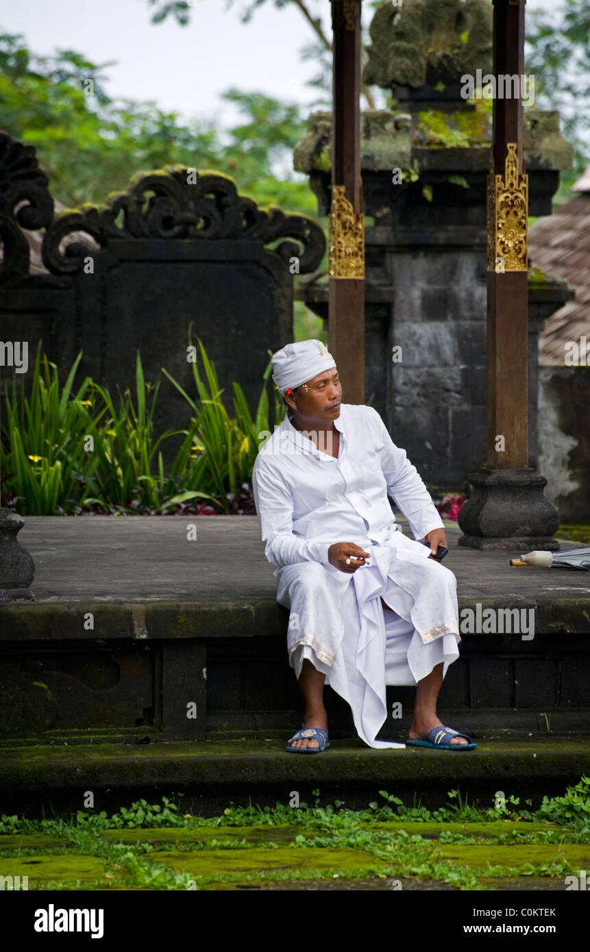 A Hindu Holy Man waits for worshipers at the most important temple in ...