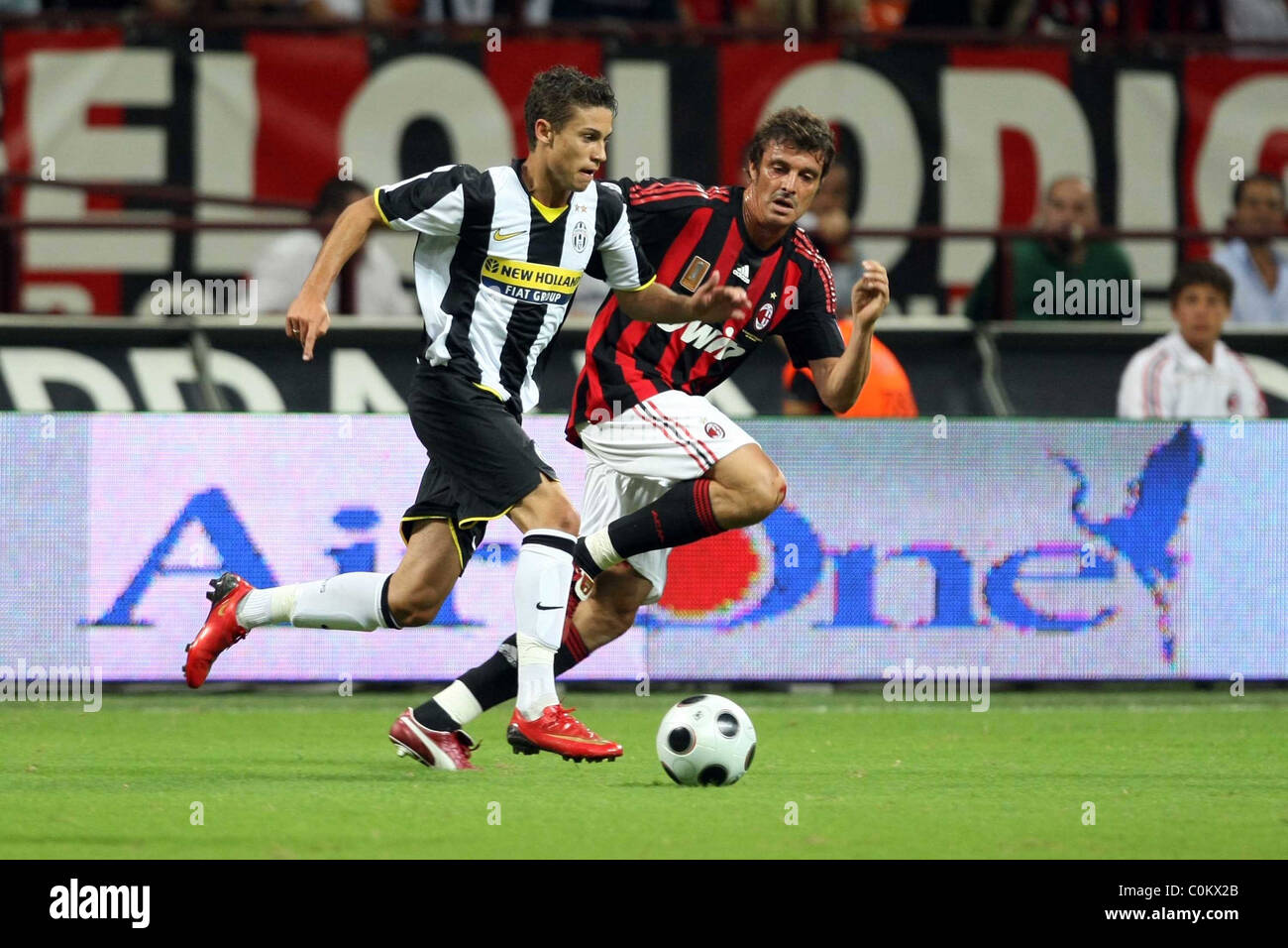 Fausto Rossi of Juventus and Giuseppe Favalli of AC Milan playing in ...