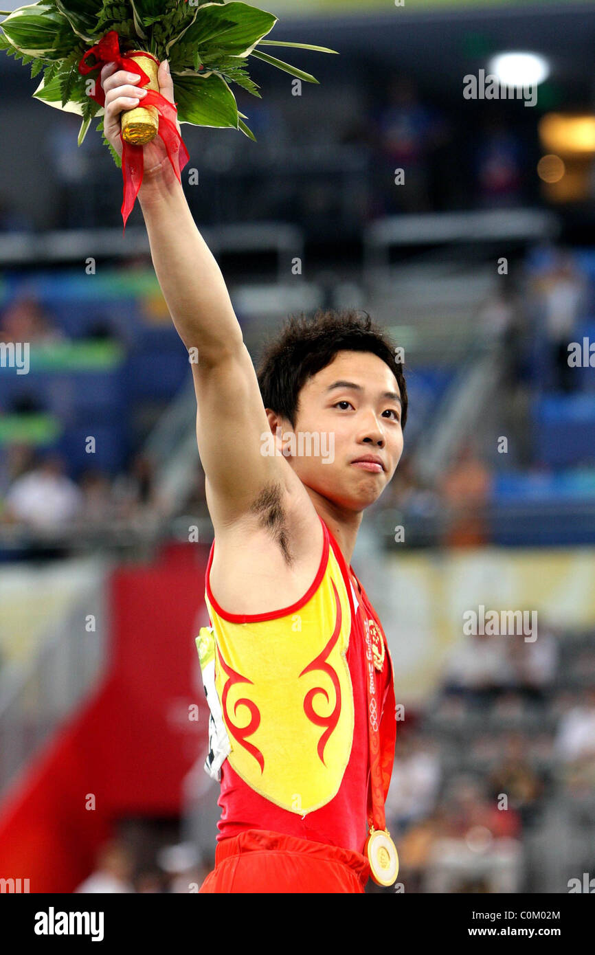 China's Zou Kai of China celebrates after finishing his routine in the ...