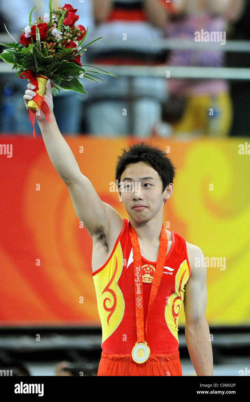 China's Zou Kai of China celebrates after finishing his routine in the ...