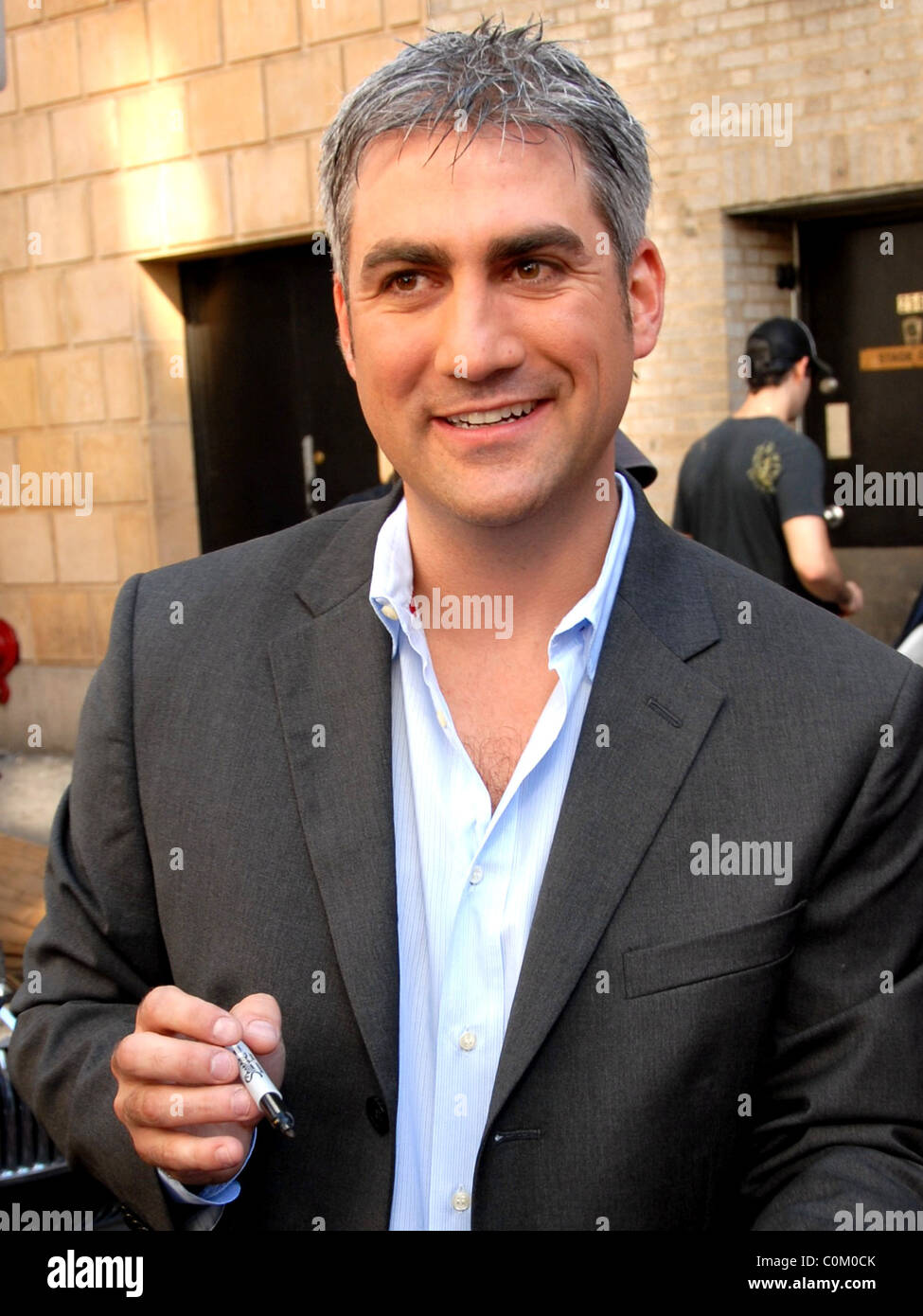 Taylor Hicks signs autographs for fans following his performance in the ...