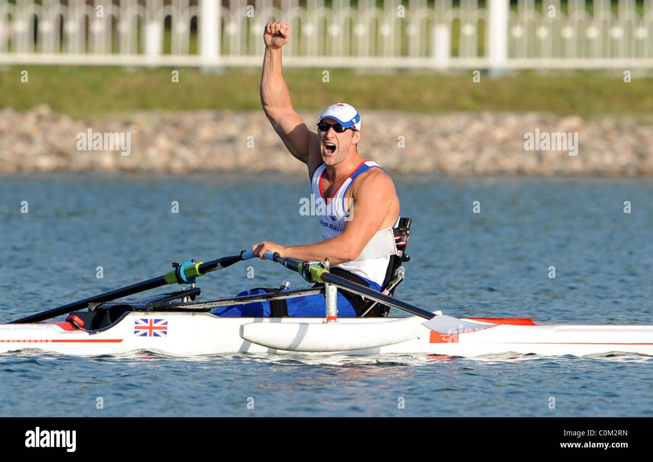British world champion Tom Aggar celebrates after rowing to victory in ...
