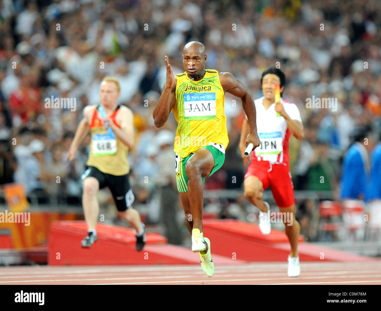 Asafa Powell of Jamaica during the 4 x 100m Relay at Beijing Olympic ...