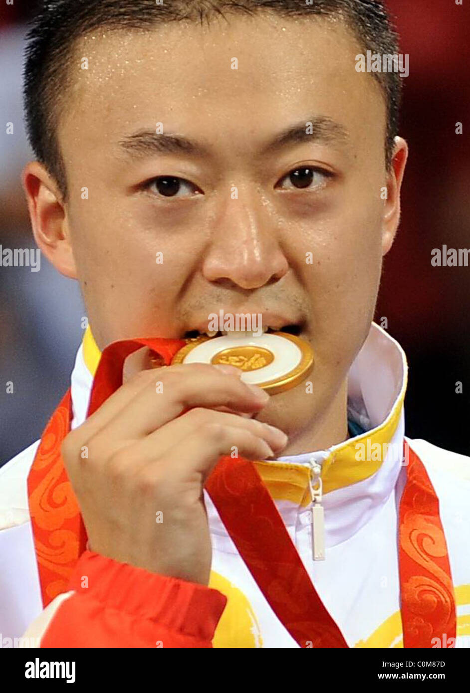 Gold medalist Ma Lin celebrates. China made a clean sweep of medals in ...