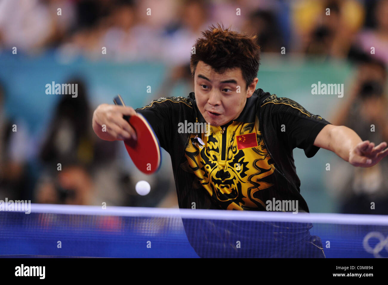 Wang Hao competes in the gold medal match. China made a clean sweep of ...