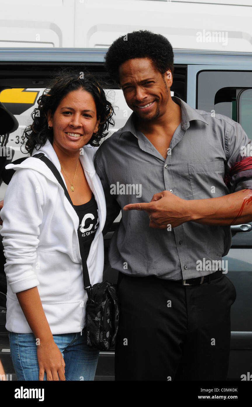 Gary Dourdan posing with a fan at the set of the movie "Fire" at ...