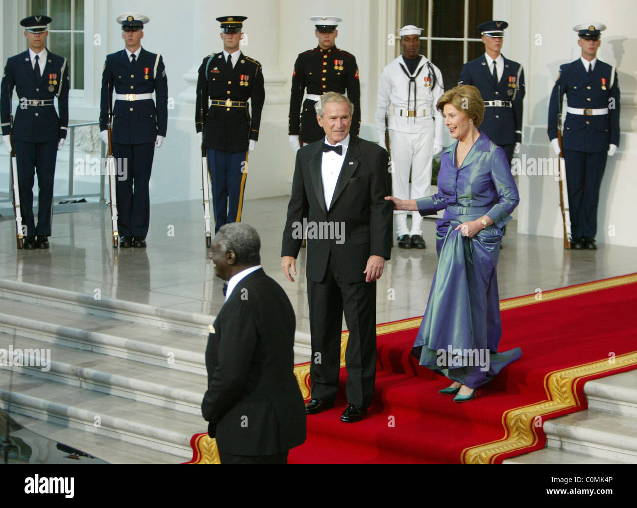 President George Bush and Mrs. Laura Bush greet the President of Ghana ...