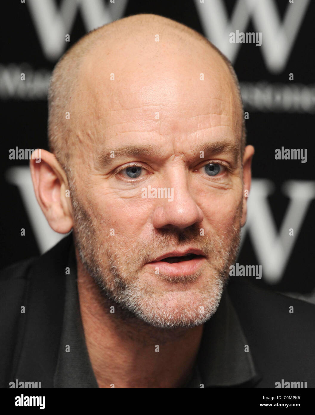 Michael Stipe of R.E.M signing their new book 'Hello' at Waterstone's ...