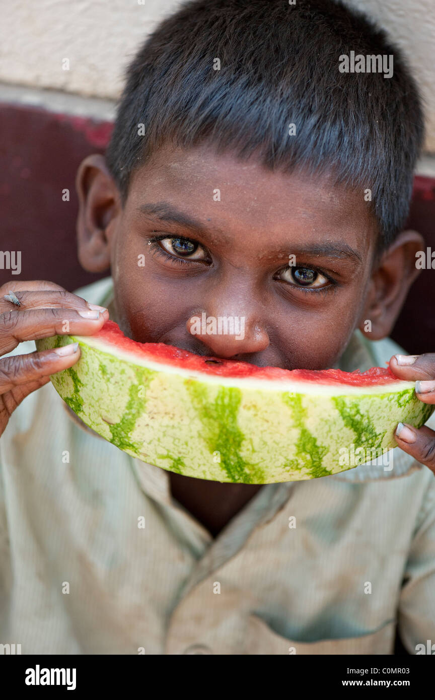 Indian poor child eating food hi-res stock photography and images - Alamy