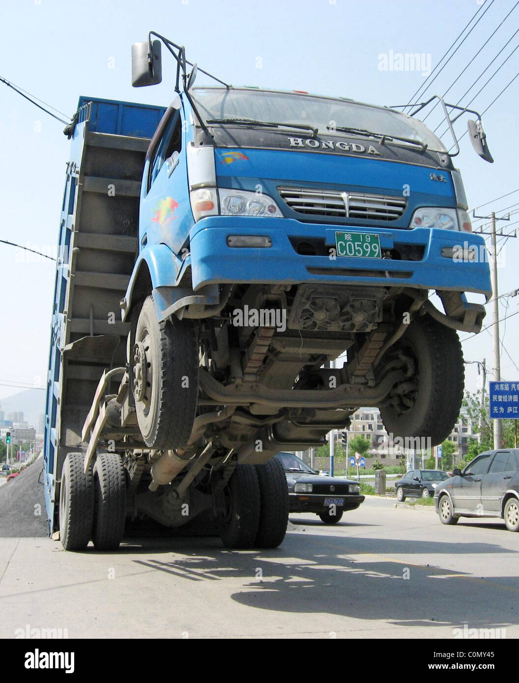 HEAVY LORRY REACHES FOR THE SKIES That's some wheelie! This chemical ...