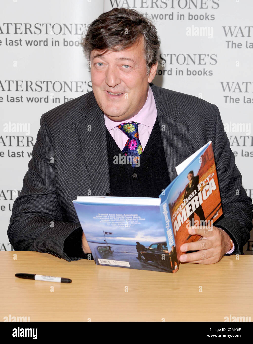 Stephen Fry signs copies of his new book 'Stephen Fry In America' at ...