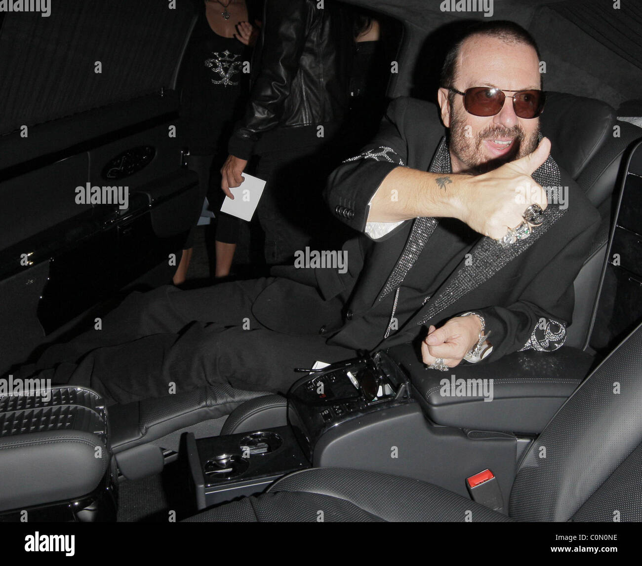 Dave Stewart leaves the Sunset Marquee Hotel under police escort ...