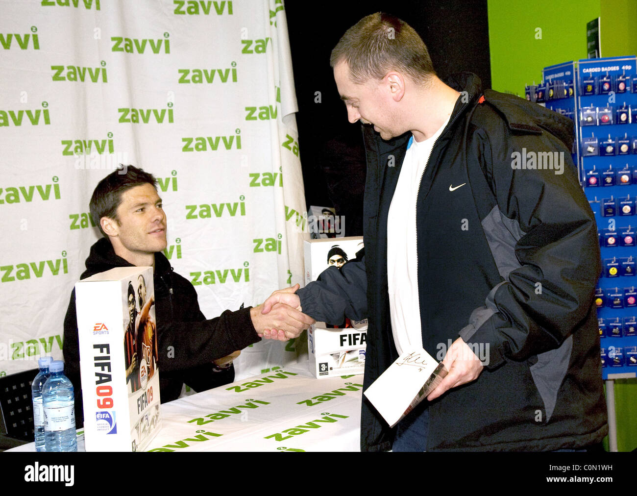 Liverpool star xabi alonso signs hi-res stock photography and images ...
