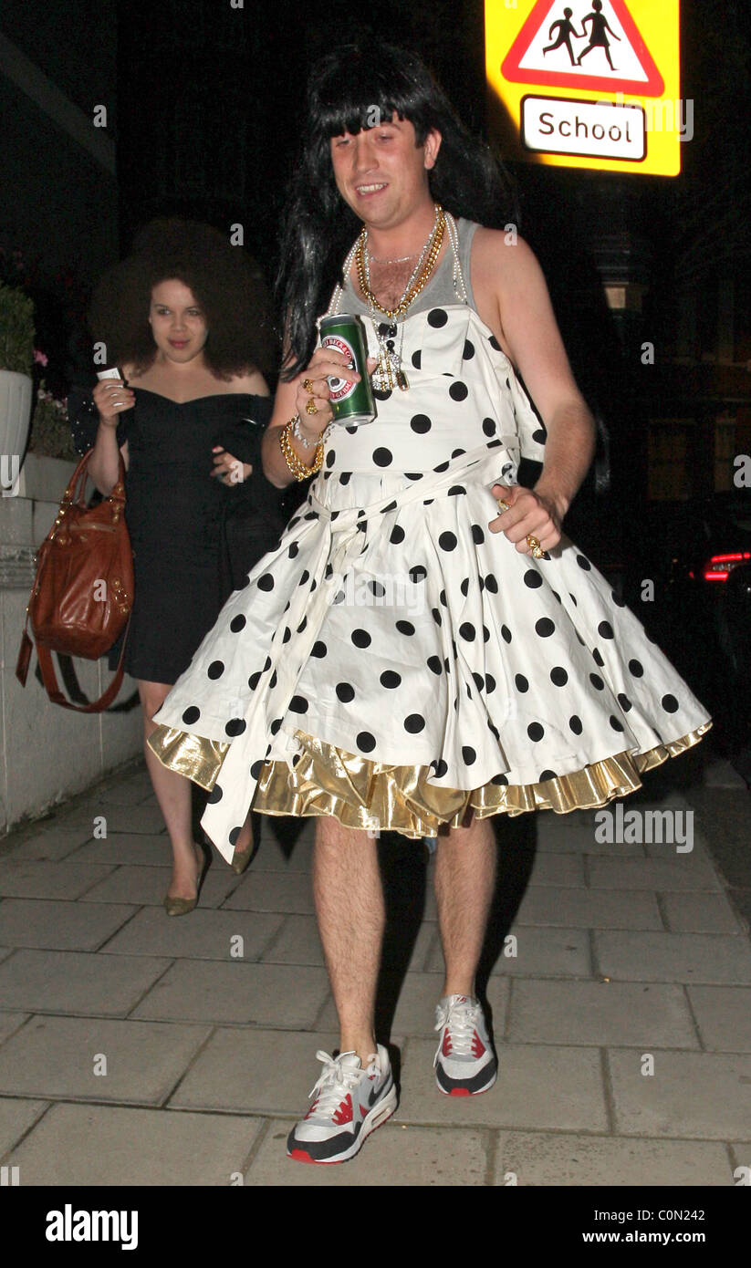 Radio1 DJ Nick Grimshaw dressed as Lily Allen waiting for a bus at The ...