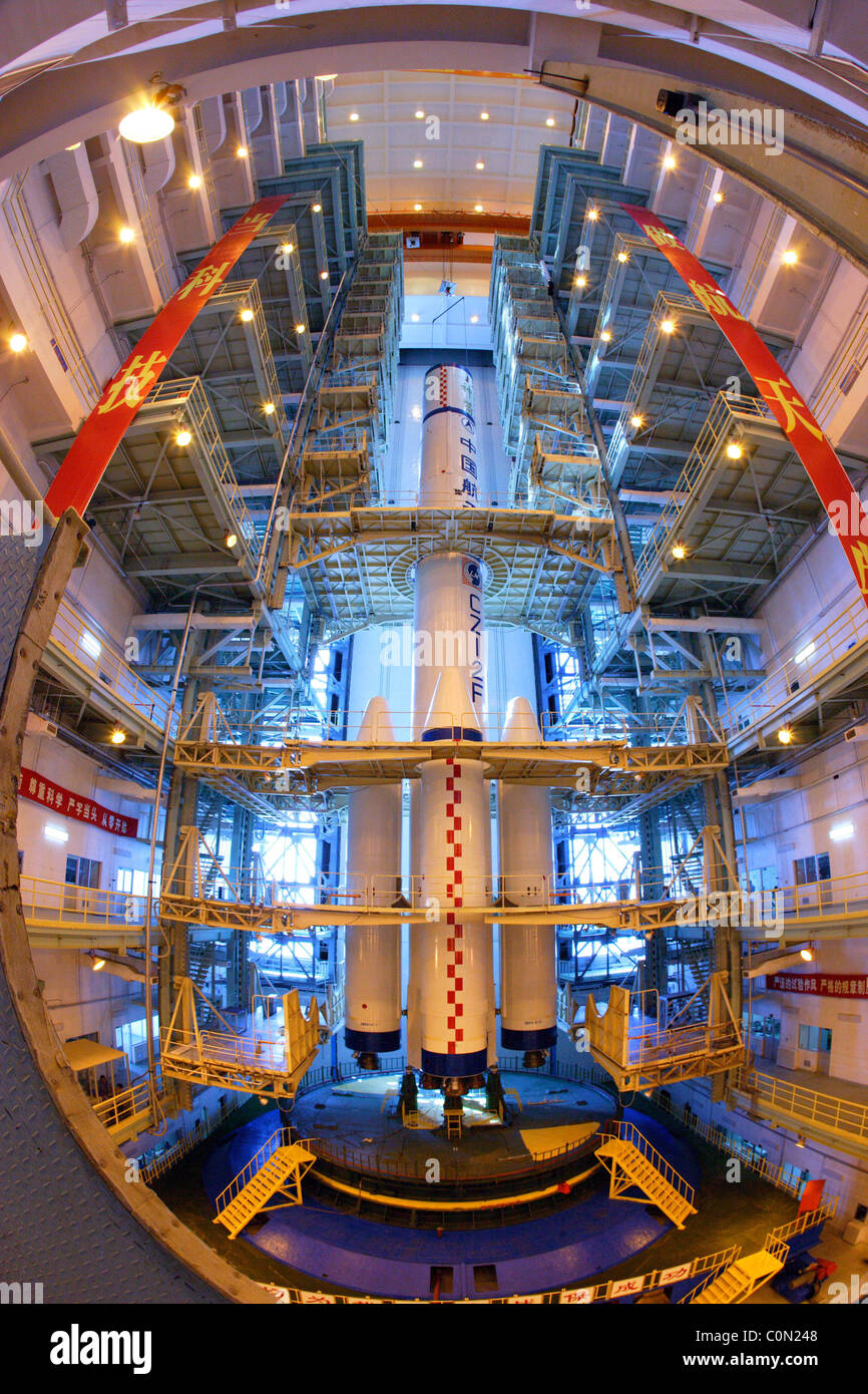 LAUNCH ROCKET IS READY FOR LIFT-OFF Scientists make last-minute checks ...