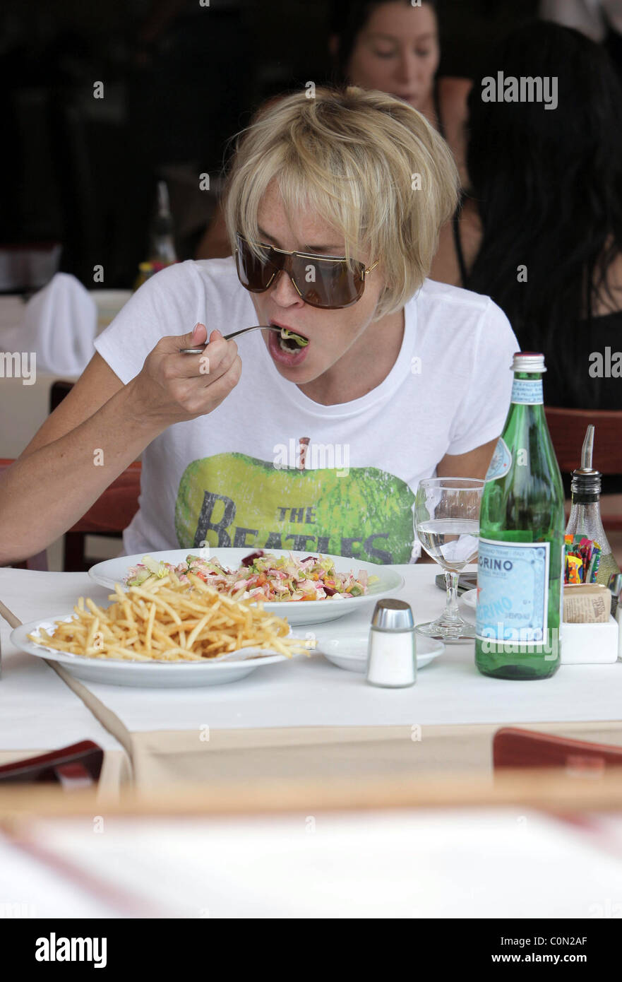Sharon Stone eats lunch at Clafoutis with a friend Los Angeles ...