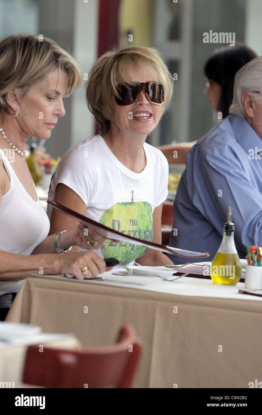 Sharon Stone eats lunch at Clafoutis with a friend Los Angeles ...