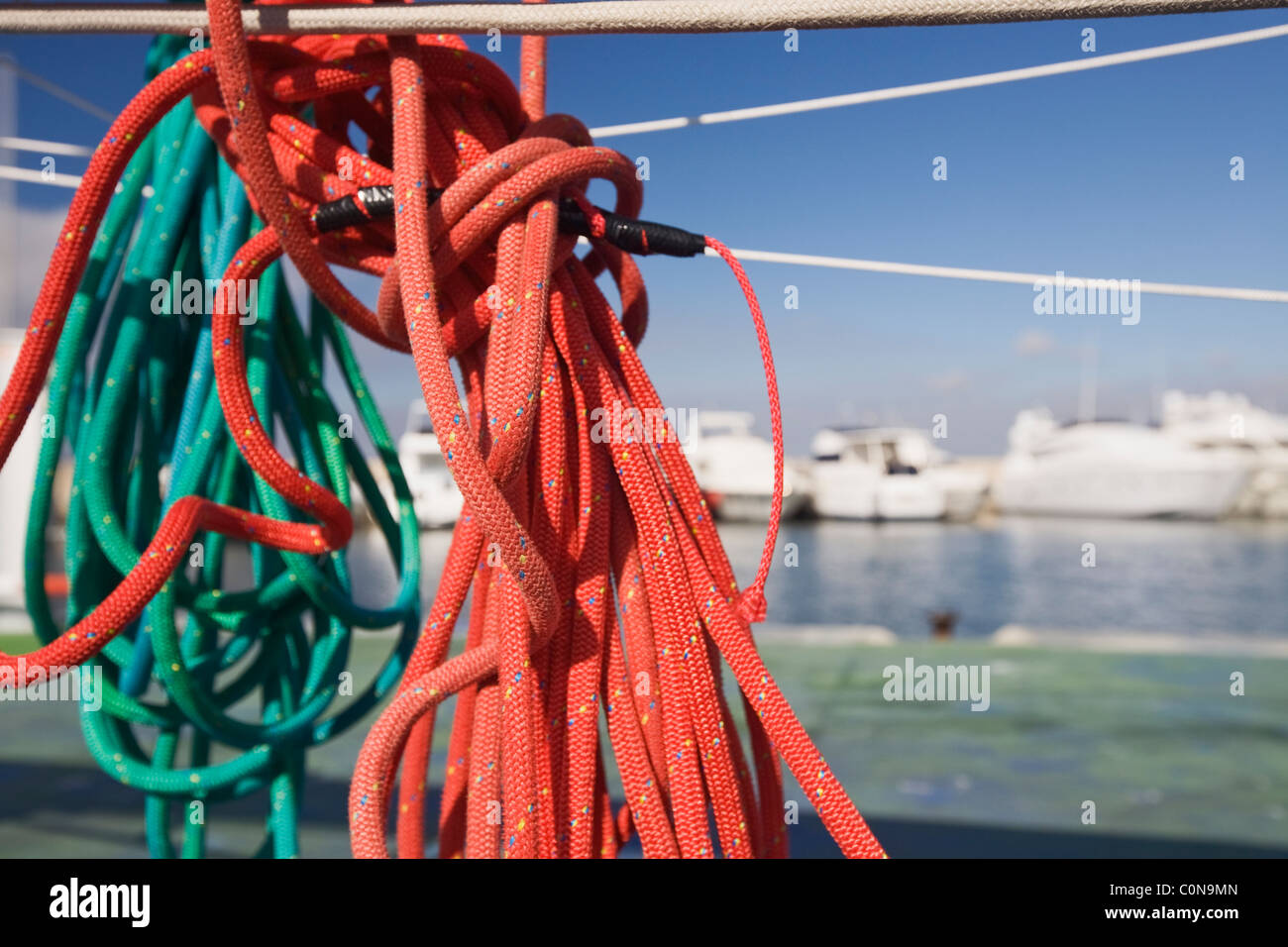 Colorful ropes in the harbour Stock Photo - Alamy