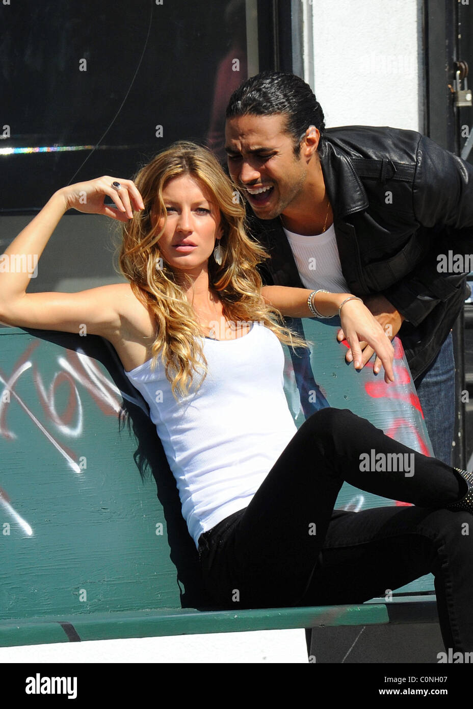 Gisele Bundchen with Jonah Johnson from the band 'Blackcowboy' filming ...