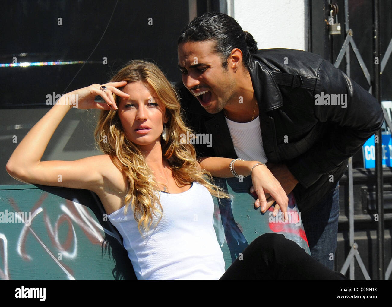 Gisele Bundchen with Jonah Johnson from the band 'Blackcowboy' filming ...